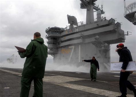 Sailors Aboard The Aircraft Carrier USS Theodore Roosevelt NARA