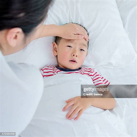 Mother And Young Son Touching Foreheads Photos And Premium High Res