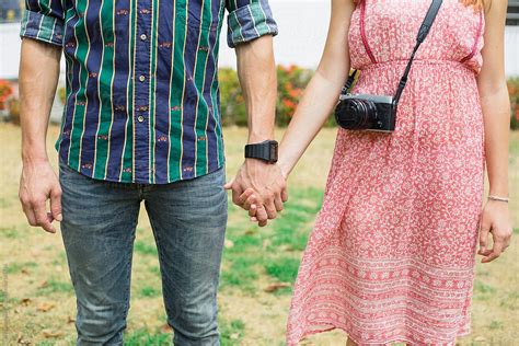 Romantic Couple Holding Hands By Stocksy Contributor Jovo Jovanovic
