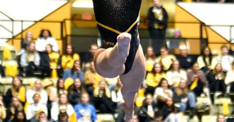 Hannah Mccrary Performs Her Routine On The Balance Beam Sports
