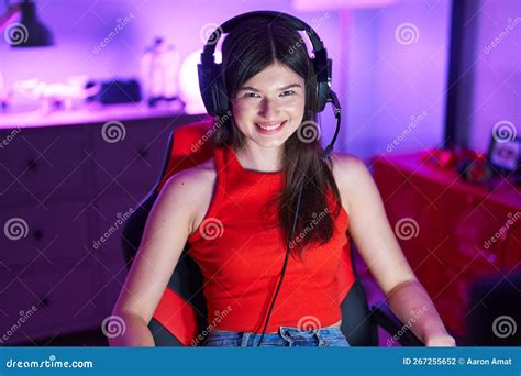 Young Caucasian Woman Streamer Smiling Confident Sitting On Table At