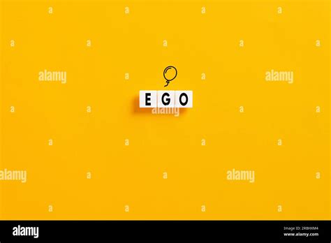 White Letter Blocks On Yellow Background With The Word Ego Selfishness