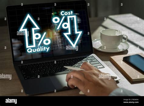 Businessman Working Strategy On Computer Cost And Quality Control
