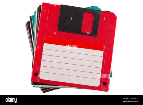 Colored Old Retro Floppy Diskettes In Stack Isolated On White
