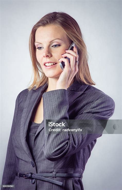 Happy Business Woman Talking On The Mobile Isolated White Background