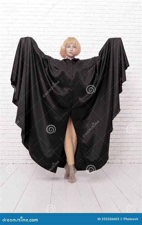 Dancing In Cloak Girl With Long Fit Legs In Orange Tights Dancing