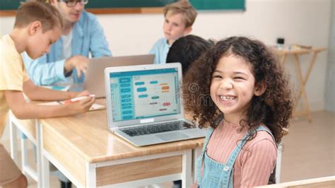American Student Turn Around And Looking At Camera In Stem Class