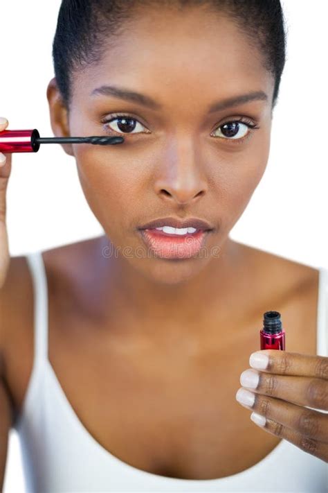 Serious Brunette Using Mascara For Her Eyelashes Stock Image Image Of