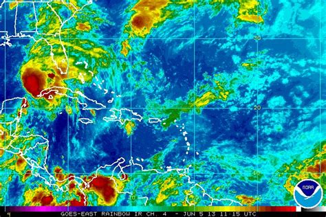 Hurricane Harbor Strengthening Tropical Disturbance Moving Towards