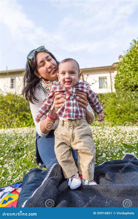 Happy baby with mummy stock image. Image of brown, months - 59916851
