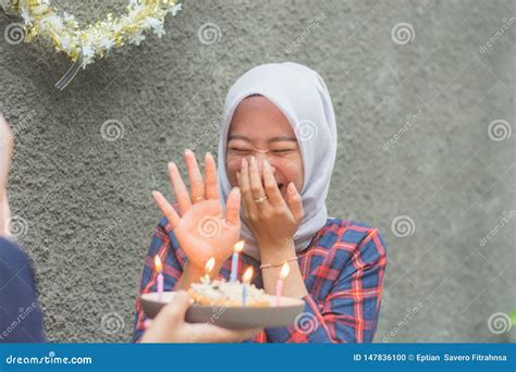 Attractive Hijab Woman Having Surprise Birthday Cake From Her