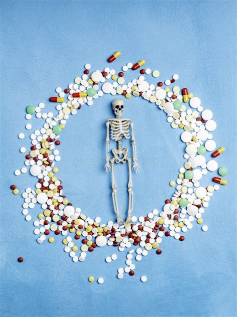Human Skeleton Medical Drugs In The Form Of Tablets Around The Skeleton