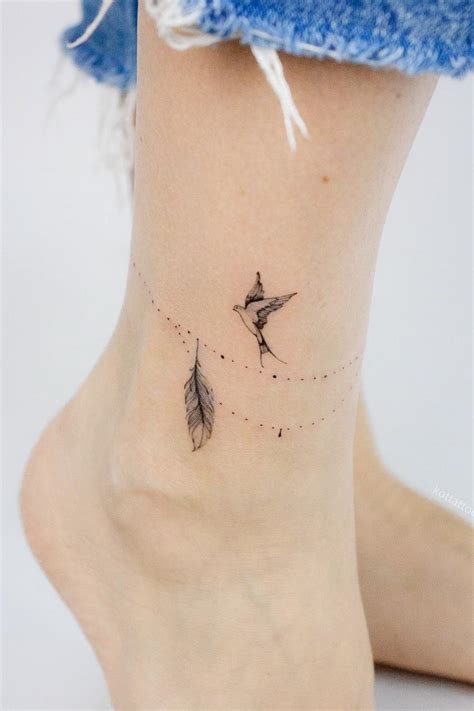 Small Feather Tattoo