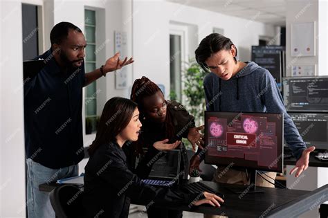 Premium Photo Team Of It Programmers Having Web Server Hacked