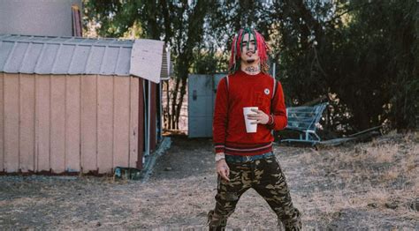 Download Hip Hop Artist Lil Pump Strikes A Pose Outside Wallpaper