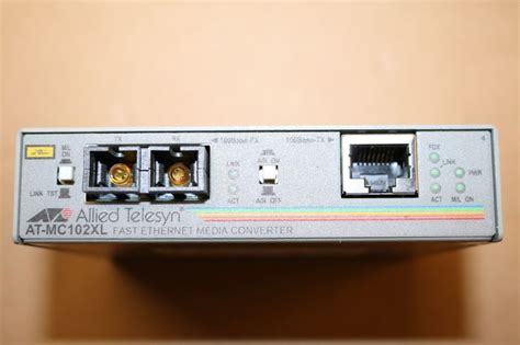 AT-MC102XL Allied Telesyn Fast Ethernet Media Converter mit div Kabel ...