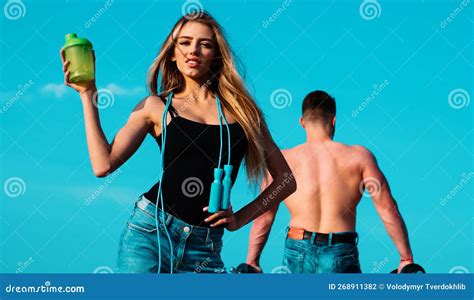 Slim Woman Fitness Trainer With Protein Shaker Smiling Young Female
