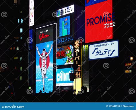 Glico Man And Neon Lighting On A Canal In Dotonbori Osaka Editorial