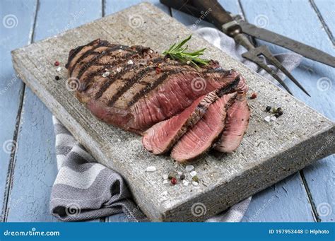 Traditional Barbecue Dry Aged Angus Sirloin Beef Steak On A Design