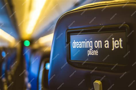Premium Photo Interior Of An Airplane With A Sign On The Screen