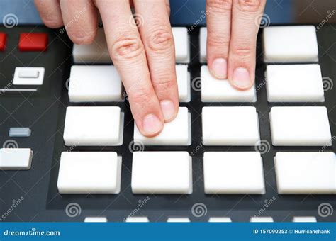 Hip Hop Beat Maker Producing New Beats With Midi Controller Device In