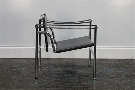 Sublime Cassina Lc1 Armchair In Black Leather And Chrome Lord