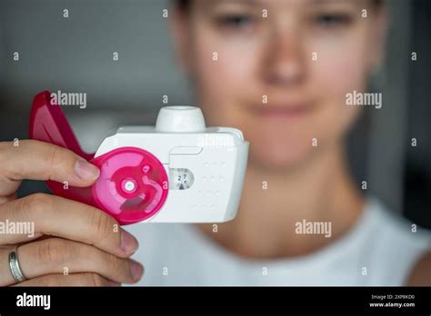 Close Up View Of Woman Holding Medicine Dry Powder Inhaler For Treatment Asthma Or Copd Diseases