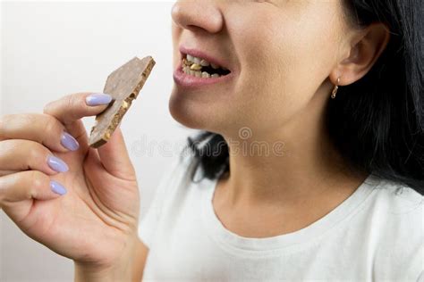 Woman Eating A Chocolate Bar Close Up Stock Image Image Of