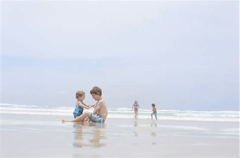 Beach Photograhy Ideas Lifestyle Photography Siblings Swimming Outdoors Open Spaces Blue