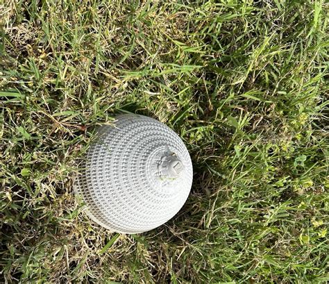 Weird Cone Thing With Designs It Is Made Out Of Cement And Has Designs