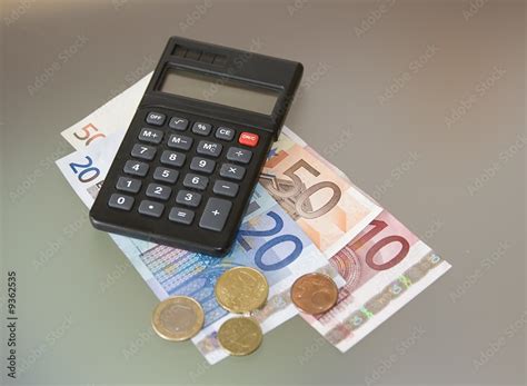 Taschenrechner Mit Geld Und Hand Stock Foto Adobe Stock