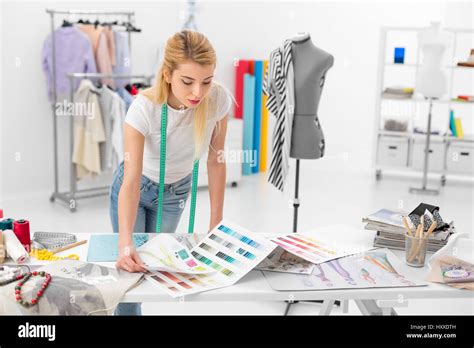 Female Fashion Designer At Work