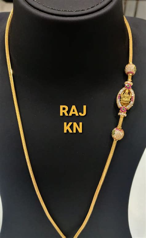 Gold Necklace With Raj Kn Written