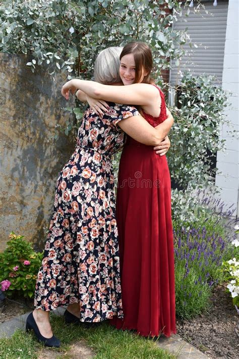Portrait Of Mother And Teenage Daughter In Loving Embrace Stock Photo Image Of Intimate