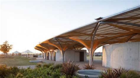 Marsden Park Pavilion In Sydney Is Shaded By A Canopy Of Golden Mesh