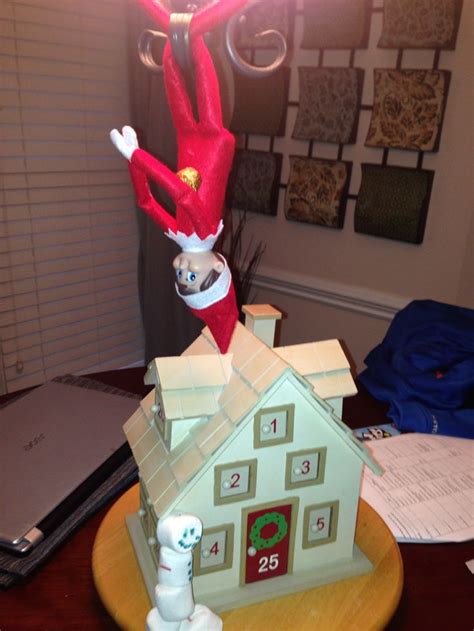 Elf On The Shelf Mission Impossible Style Grabbing Candy From Advent
