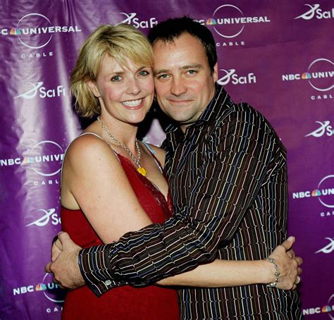 Amanda Tapping Showing Her Great Legs And Posing Topless With American