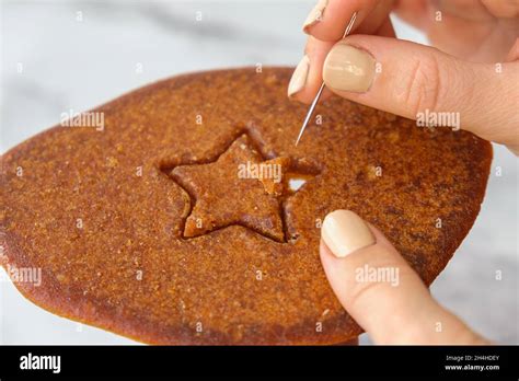 Kiev Ukraine October 2021 Playing Korean Dalgona Or Ppopgi Honeycomb Candy From Squid Game