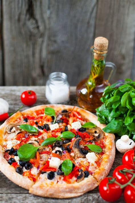 Homemade Pizza With Tomato Sauce Artichoke Hearts Olives Parmacotto