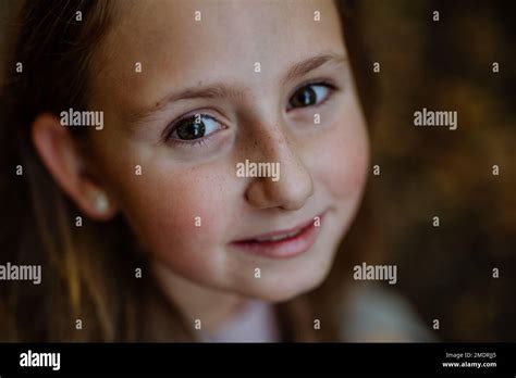 Portrait Of Girl Standing Outdoor In Forest Stock Photo Alamy