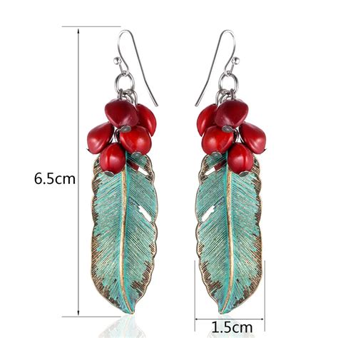 Горячая Распродажа красивые винтажные женские серьги ручной работы Зеленые перья красные бобы