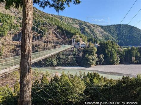 山にかかる吊り橋の写真画像素材 5993601 Snapmartスナップマート