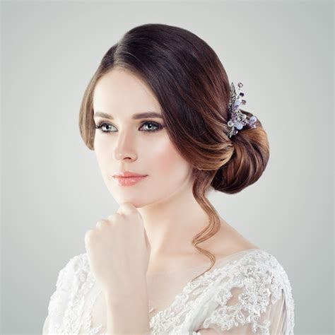 Formal Low Bun Hairstyle For Weddings