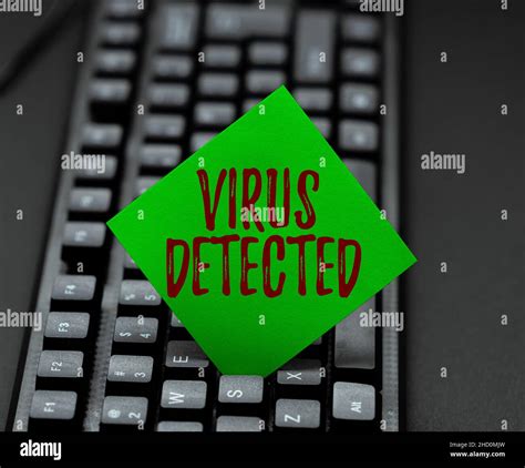 text sign showing virus detected word for a computer program used to