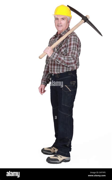 Mature Man With A Pickaxe Stock Photo Alamy