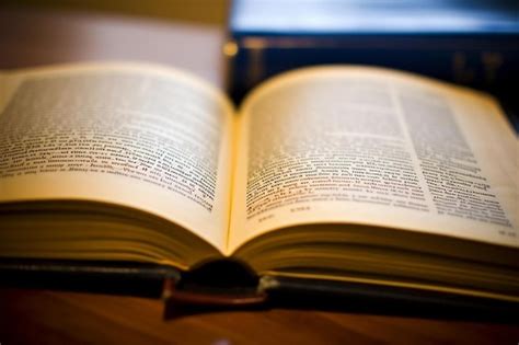 Open Textbook With Highlighted Notes Premium Ai Generated Image