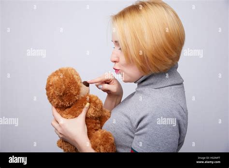 Woman With Teddy Bear Stock Photo Alamy