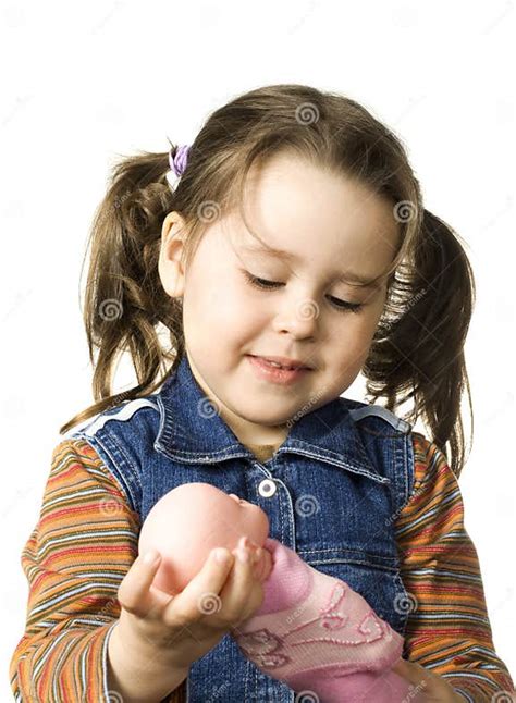 Niña Linda Con Una Muñeca Imagen De Archivo Imagen De Bebé 9205377
