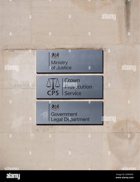 Signs On A Wall Of The Crown Prosecution Service Ministry Of Justice