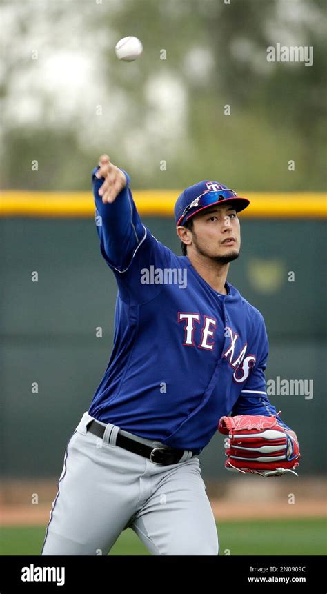 Texas Rangers Pitcher Yu Darvish Throws During Spring Training Baseball